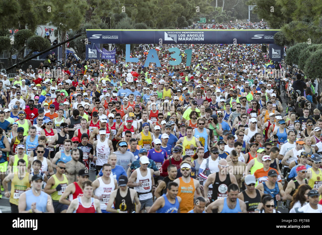 Los Angeles, California, USA. 14th Feb, 2016. Runners take off from ...