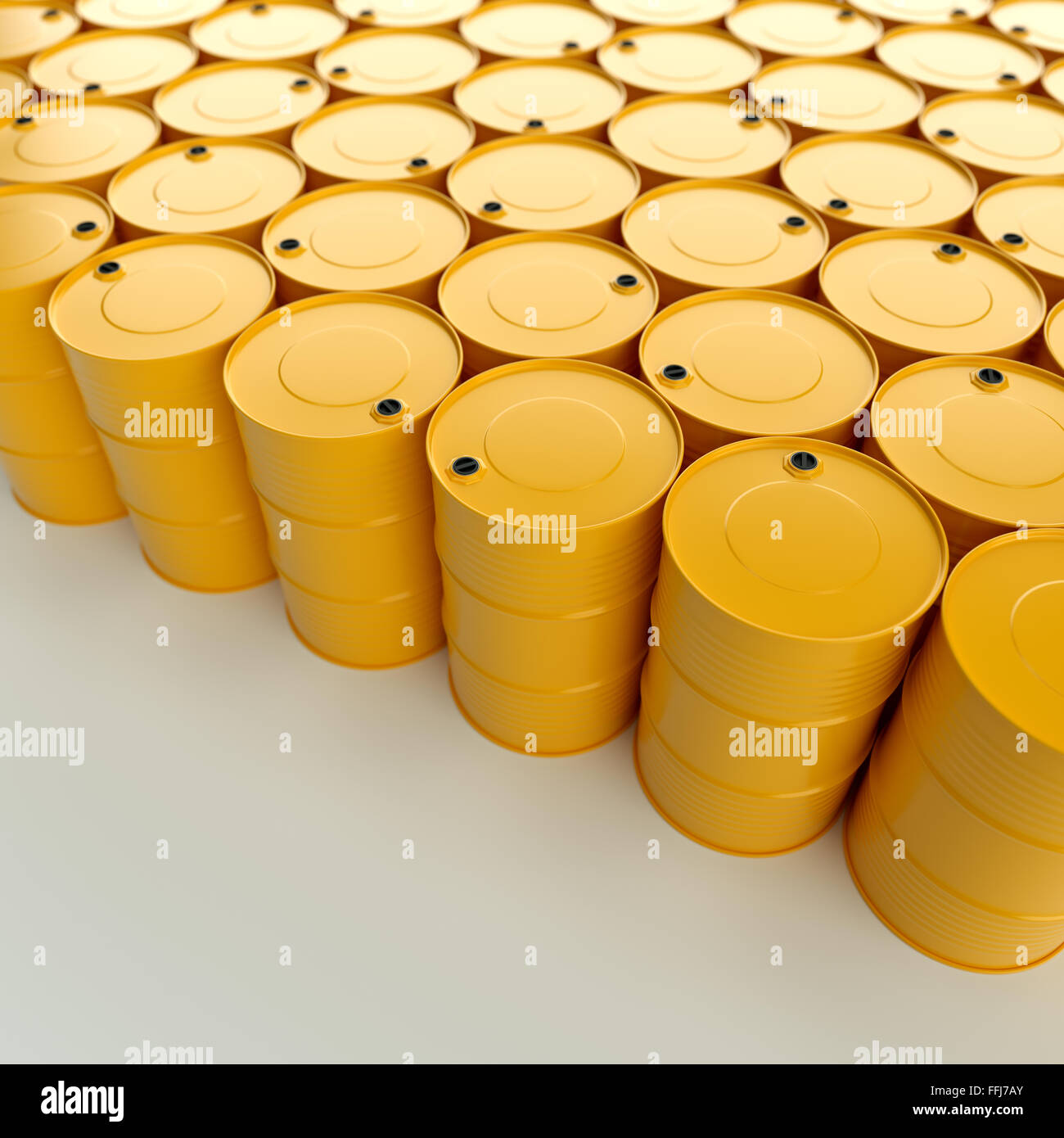 Yellow barrels on gray background Stock Photo - Alamy