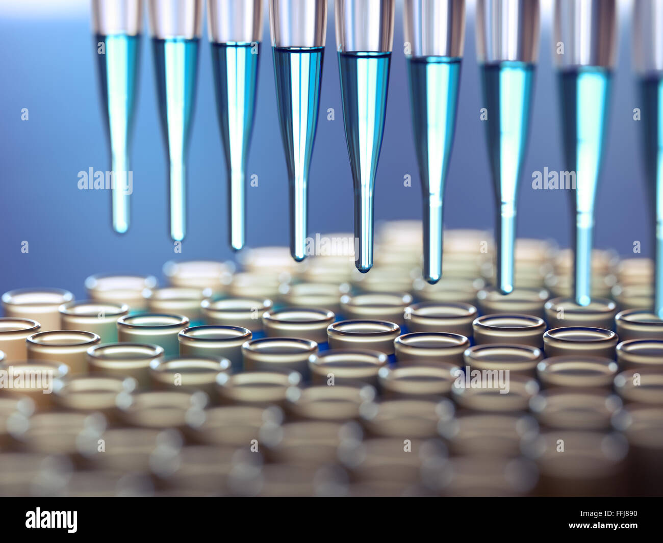 Dispensing fluid into test tubes Stock Photo - Alamy