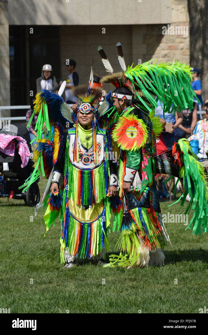 POWWOW Native Graduation Day, Friends chatting in Traditional wear ...