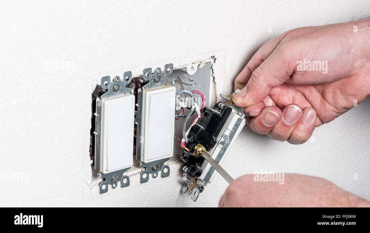 Hand light switch hi-res stock photography and images - Alamy