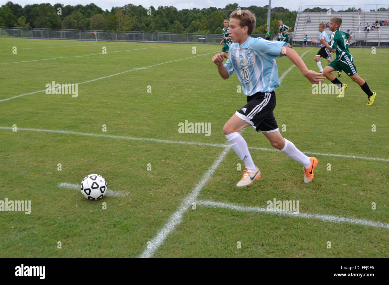 teenage boy playing soccer Stock Photo - Alamy