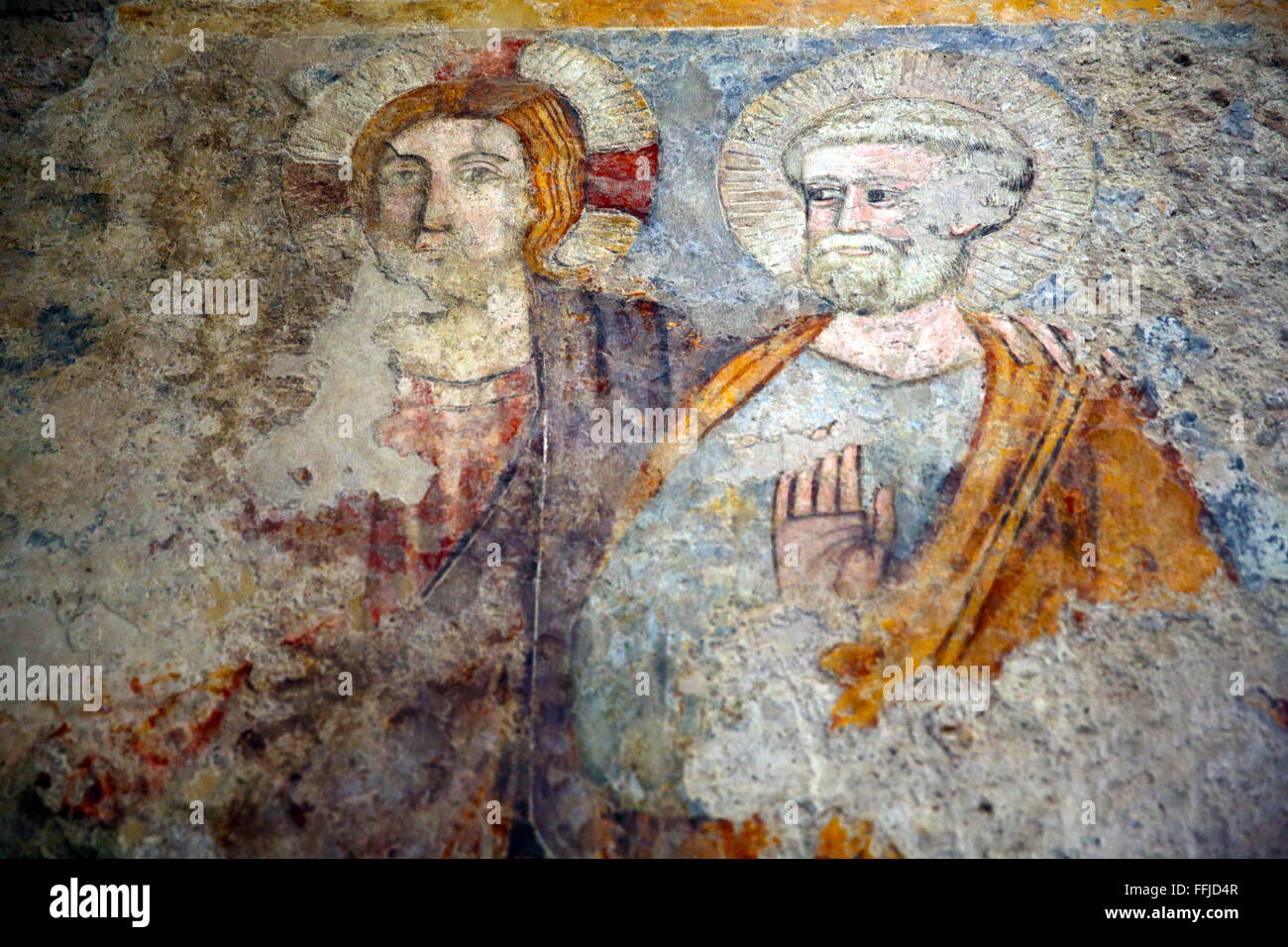 Christian frescoes on the wall of the Mamertine Prison in Rome Stock ...