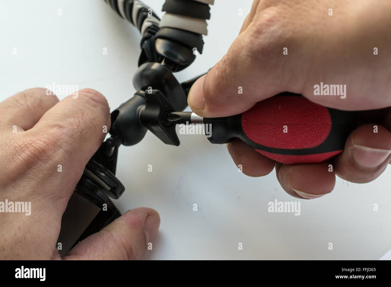 Hand turning dial hi-res stock photography and images - Alamy