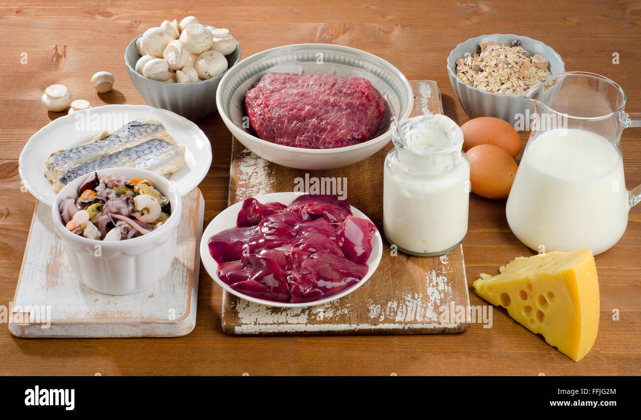 Foods Highest in Vitamin B12 (Cobalamin) on wooden background. Healthy ...