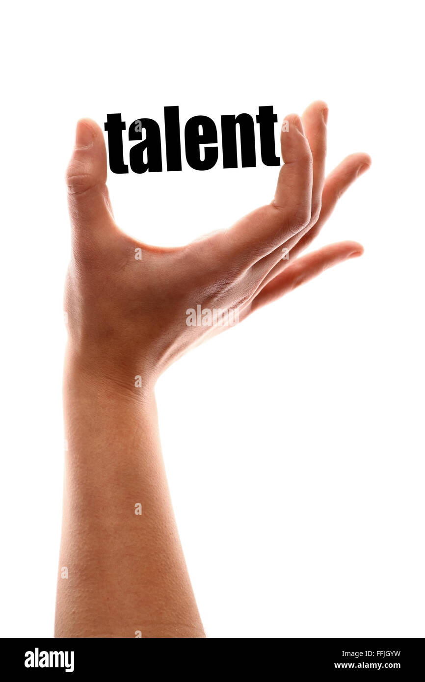 Color vertical shot of a hand squeezing the word "talent Stock Photo ...
