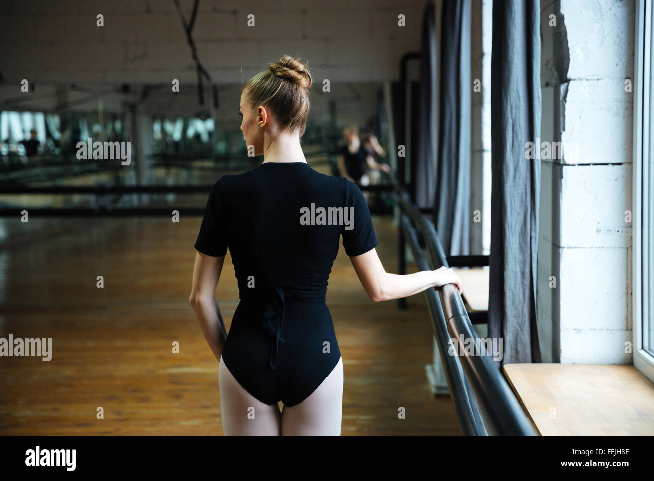 Back view dancing young beautiful hi-res stock photography and images ...