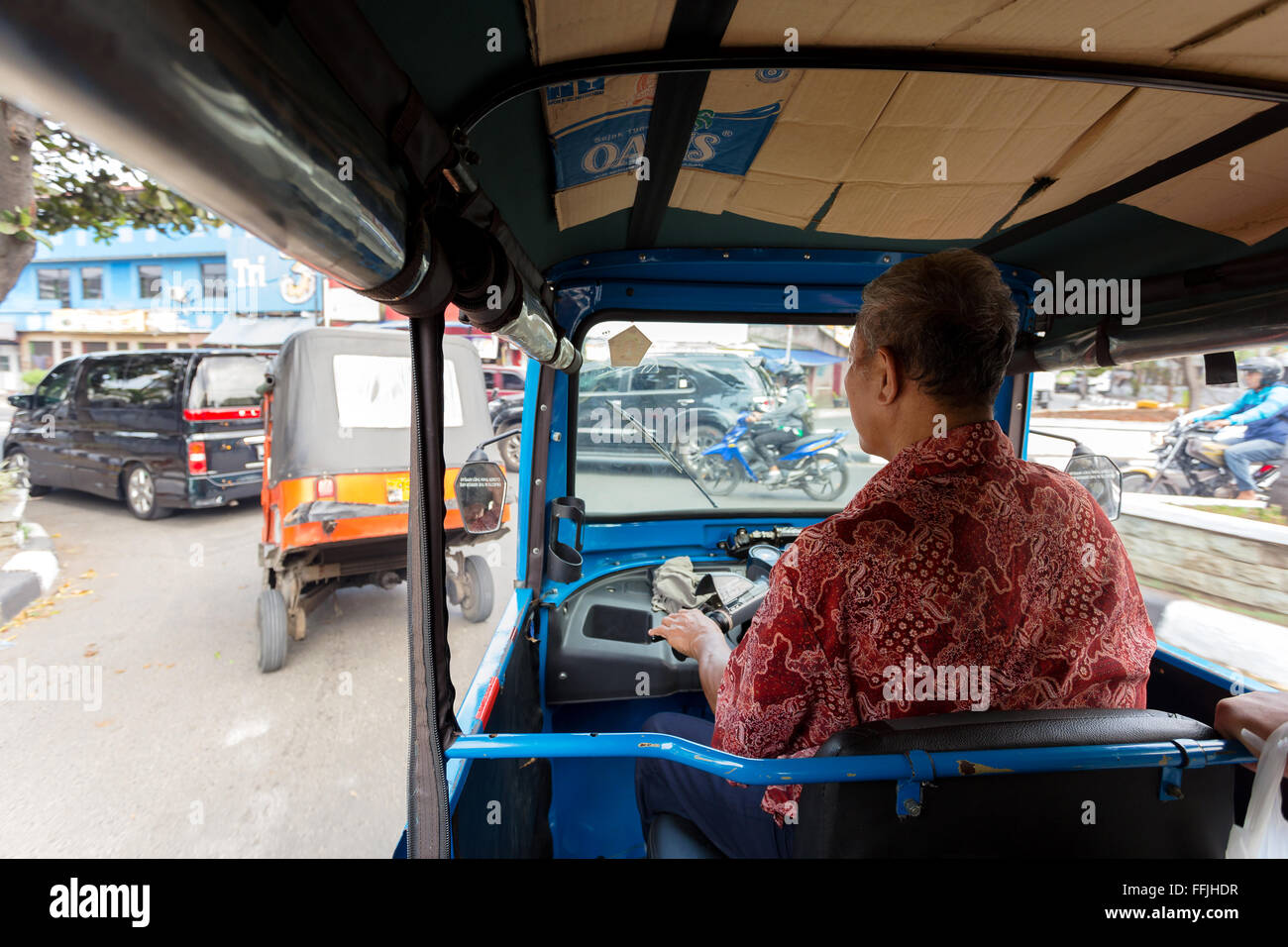 JAKARTA - August 10: Tuk Tuk motorized rickshaw common form of public ...