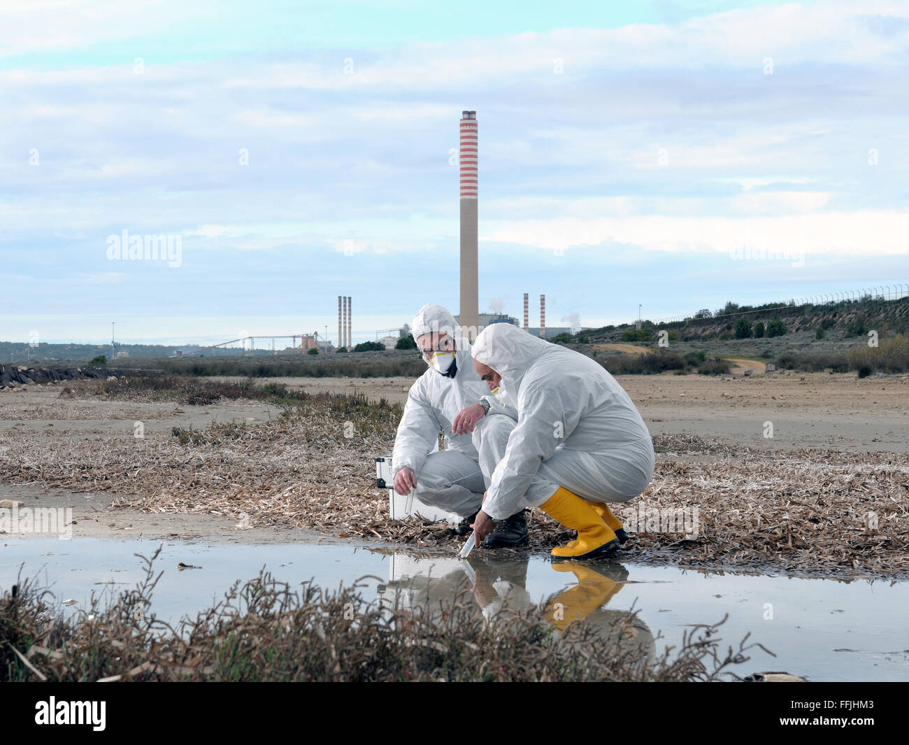 Collecting water samples for the analysis of its pollution near to an ...