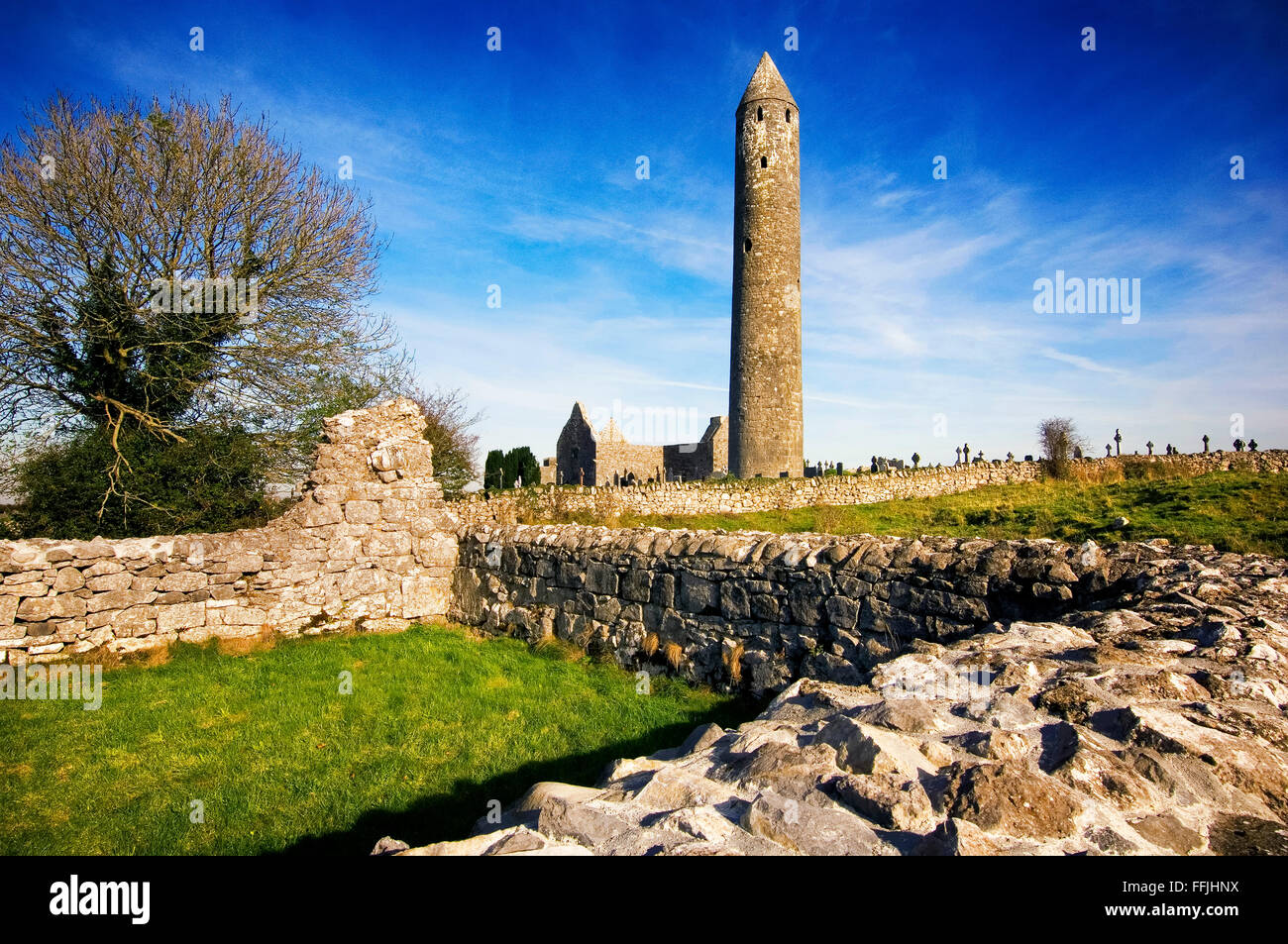 Kilmacduagh Round Tower, Galway Ireland Stock Photo - Alamy