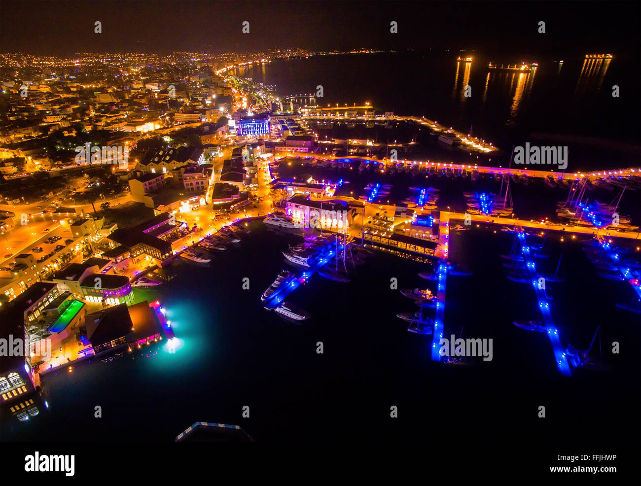 Aerial night view of the beautiful Marina in Limassol city in Cyprus. A ...