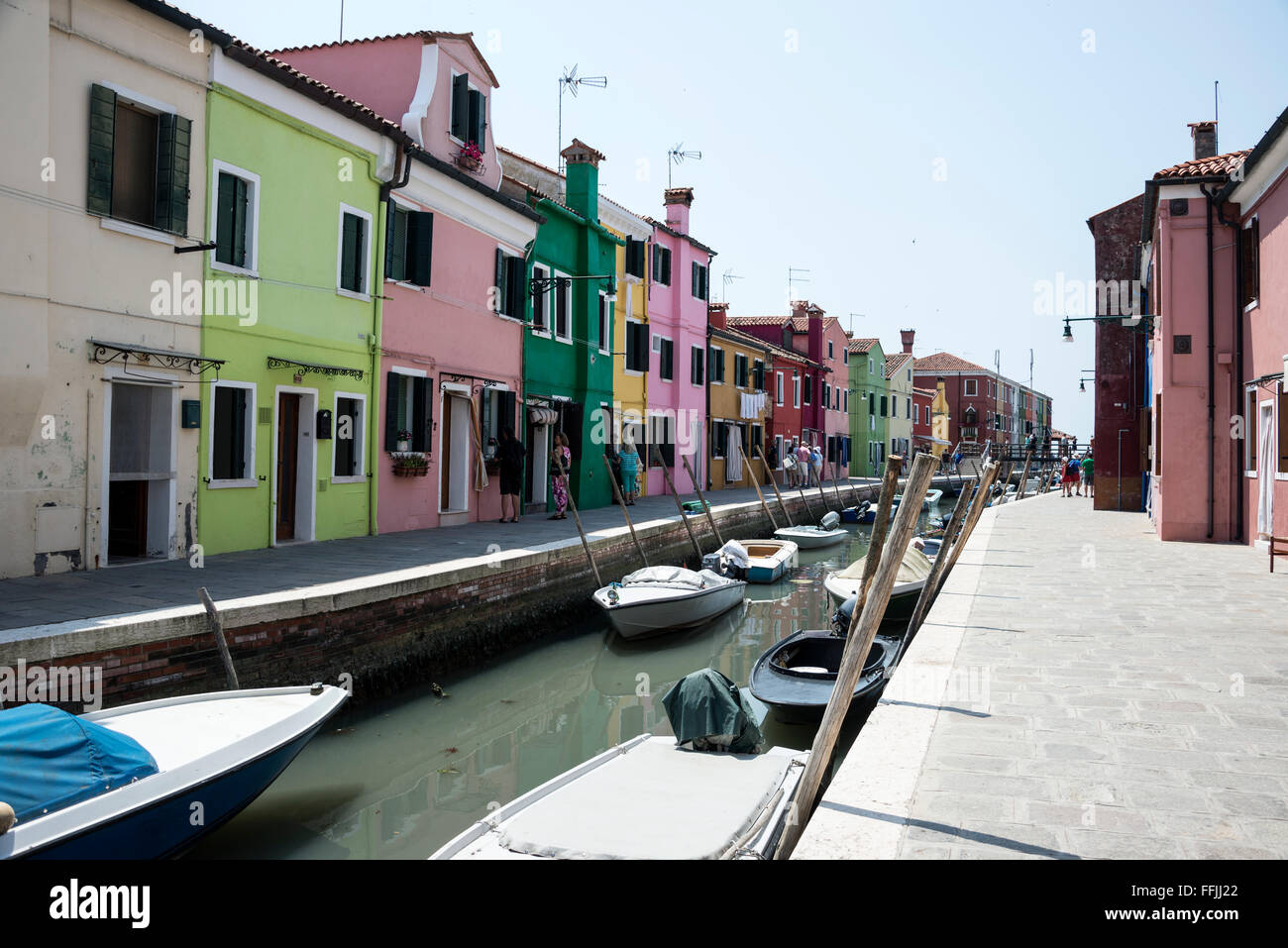 The small fishing village and tiny port of Burano, on an island in the ...