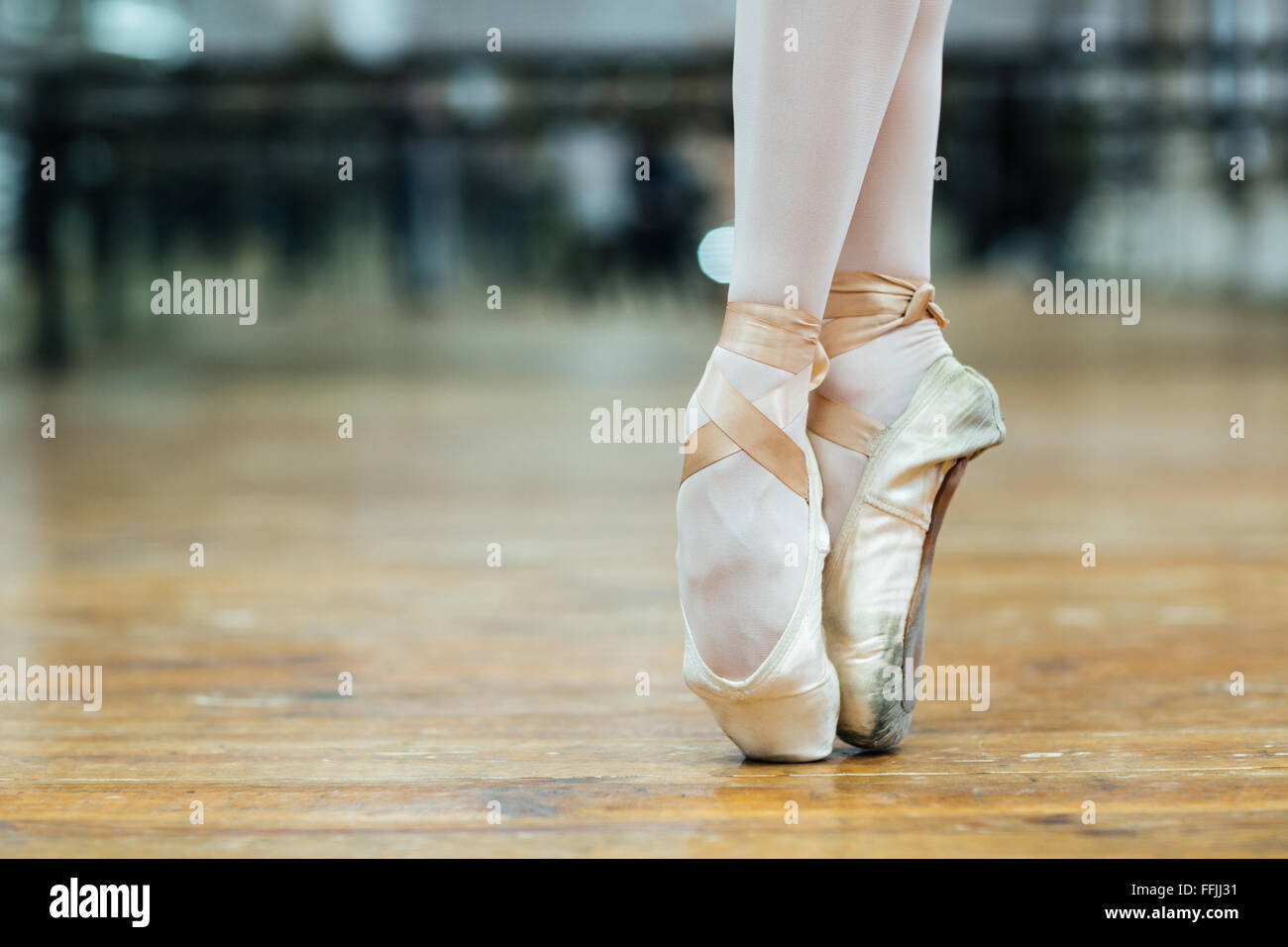 Cropped image of a female ballet dancer standing on toes Stock Photo ...