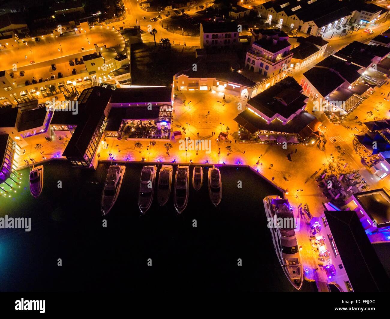 Aerial night view of the beautiful Marina in Limassol city in Cyprus. A ...