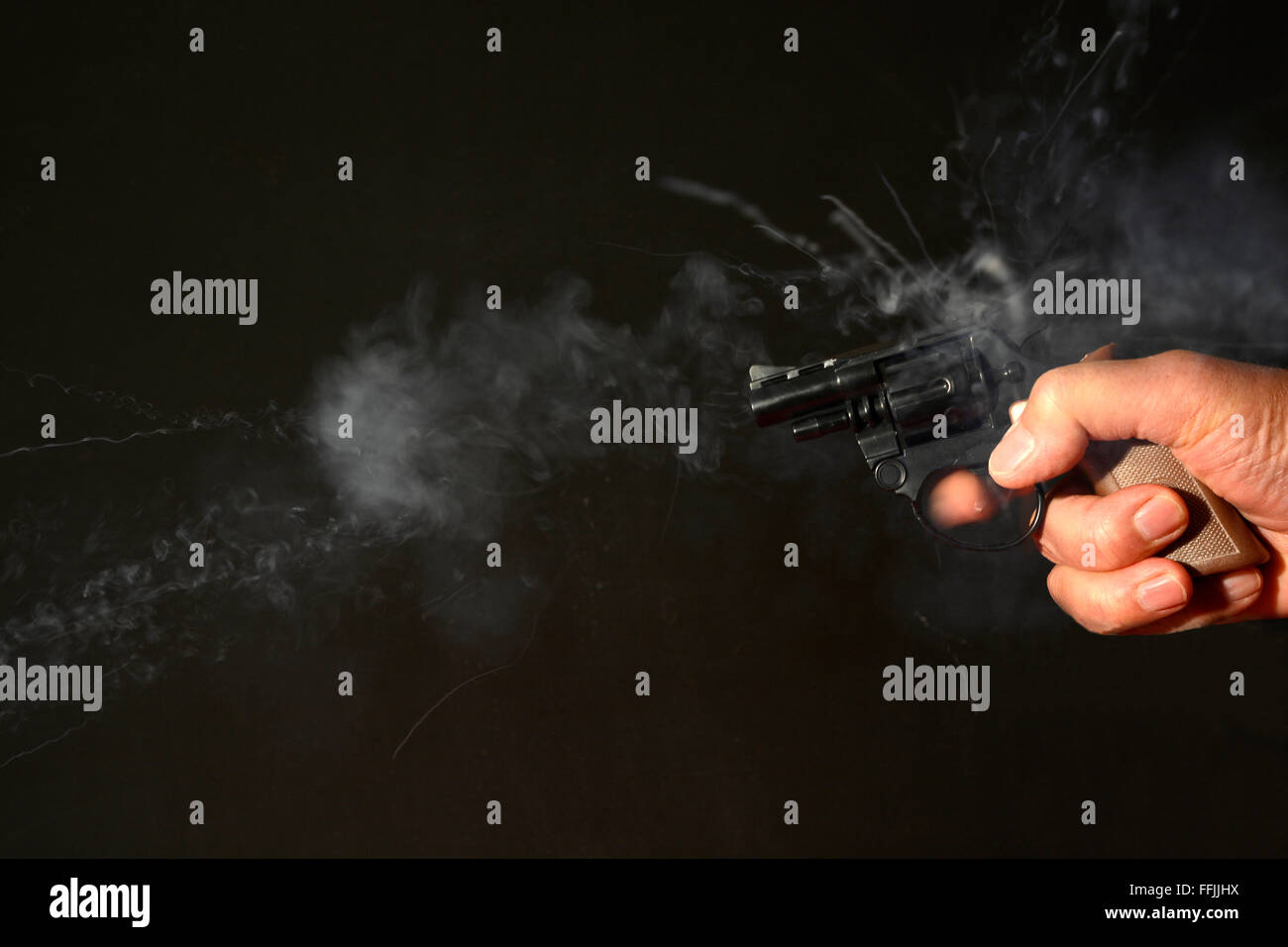 Toy revolver hi-res stock photography and images - Alamy