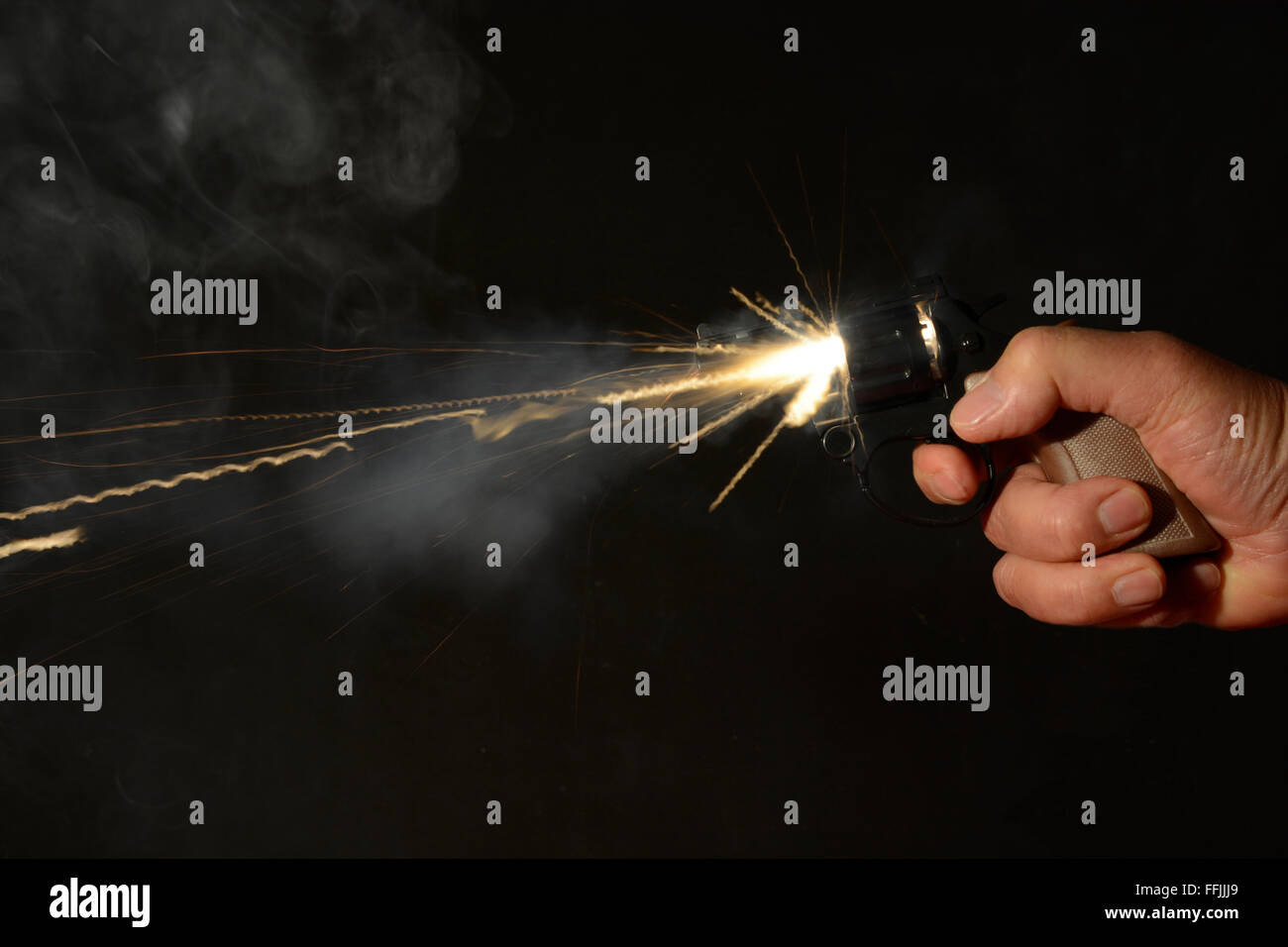 Firing handgun smoke hi-res stock photography and images - Alamy