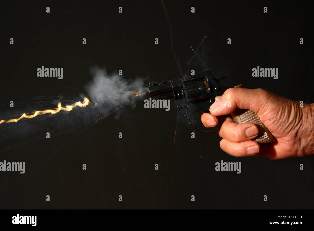 Firing handgun smoke hi-res stock photography and images - Alamy