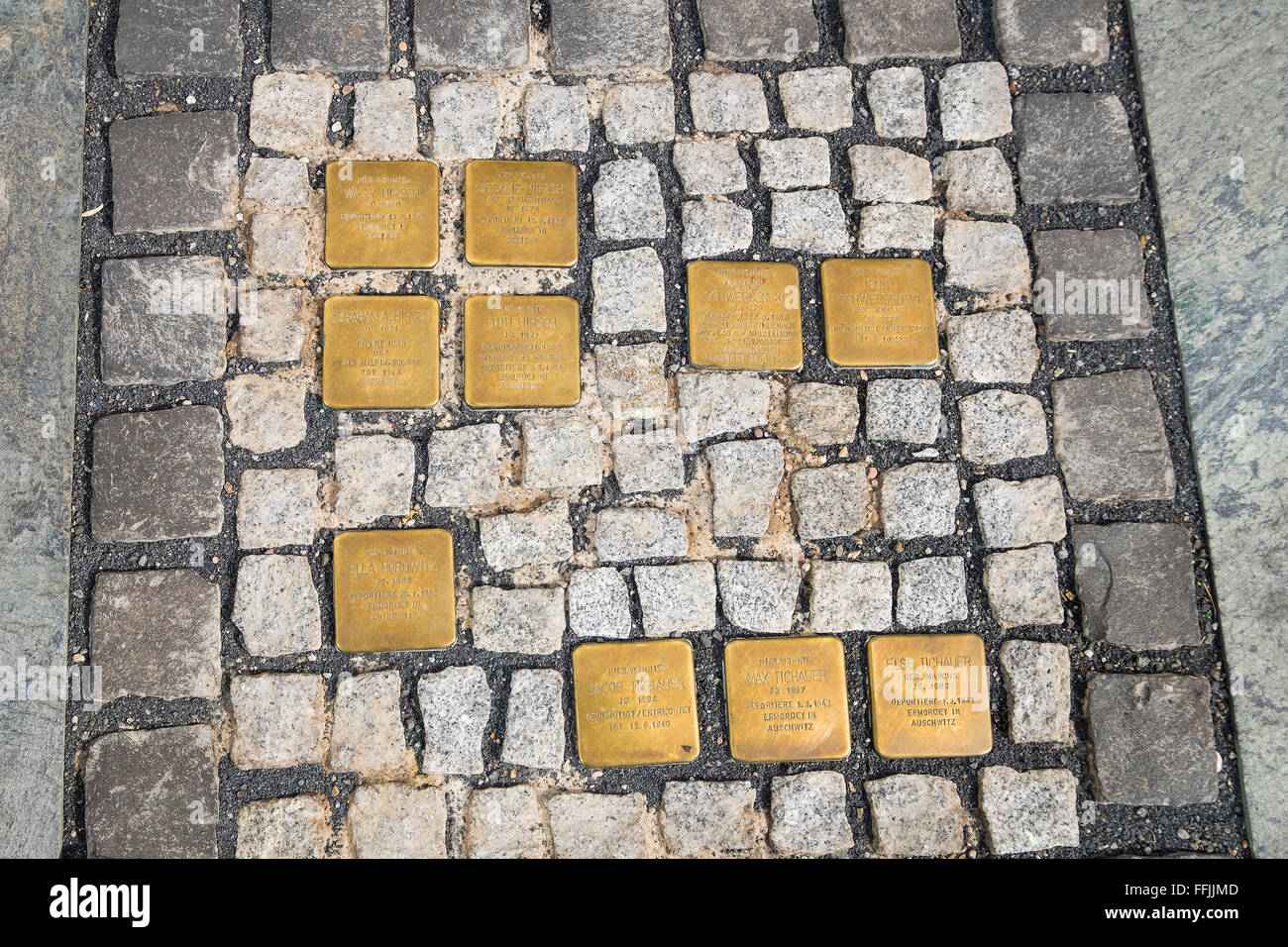 These brass blocks (stolperstein), set into the footpath, commemorate ...