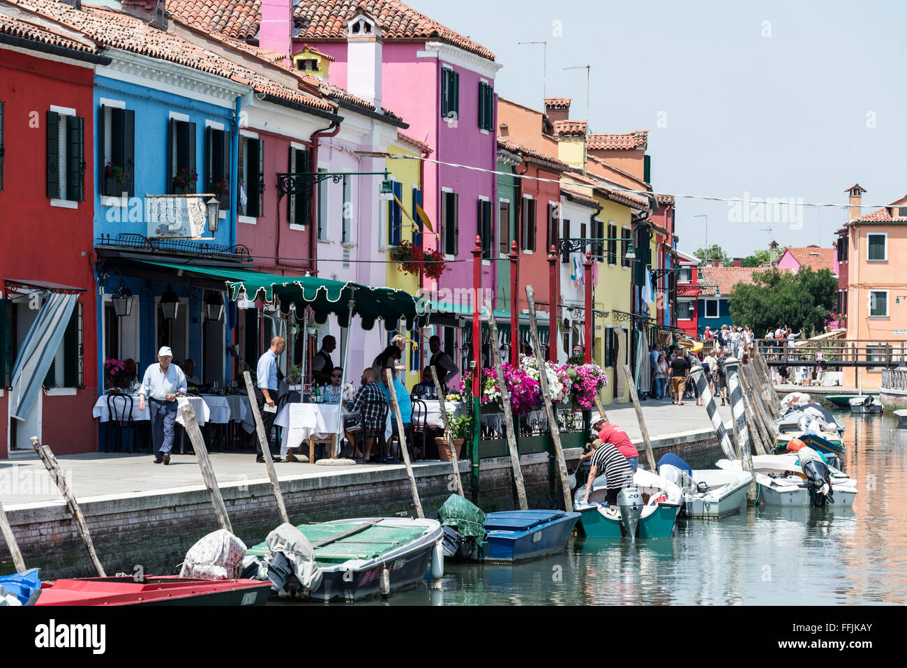 The small fishing village and tiny port of Burano, on an island in the ...
