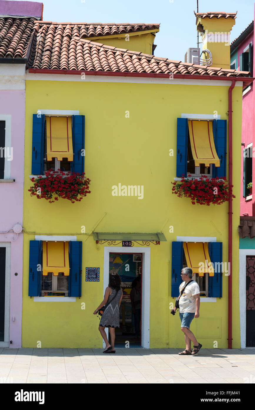 The small fishing village and tiny port of Burano, on an island in the ...