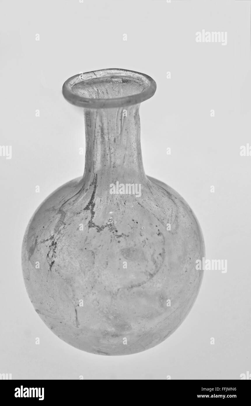 Ancient roman glass vase with round bowl slim neck and lip around the ...
