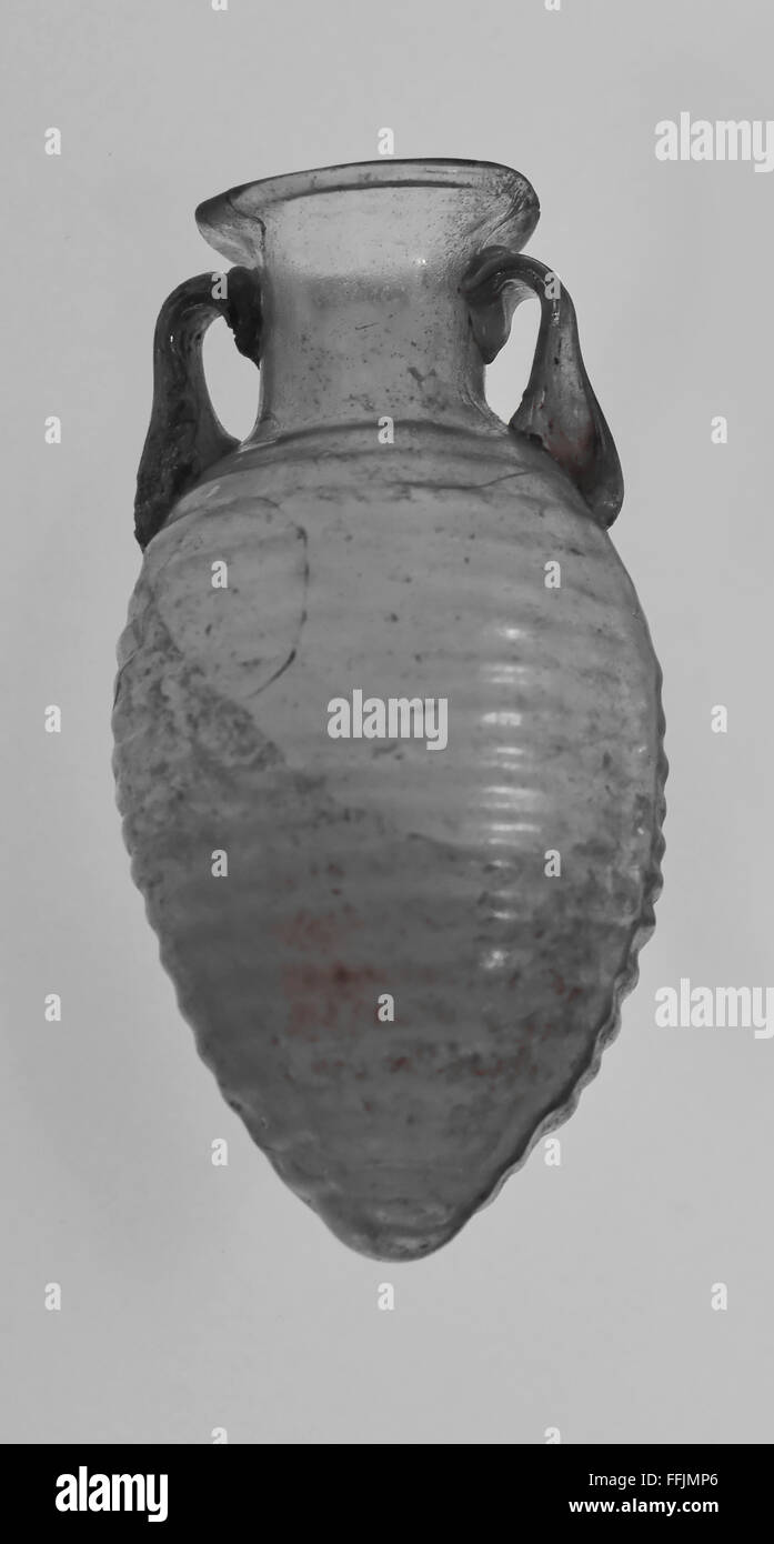 Ancient roman small and clear glass phial with handles and ...