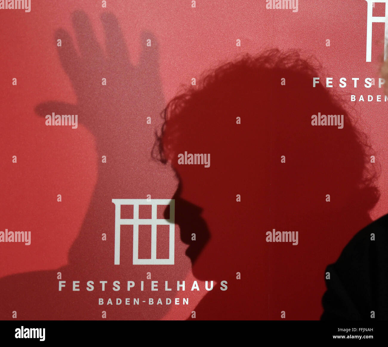 Baden-Baden, Germany. 15th Feb, 2016. The shadow of Sir Simon Rattle ...