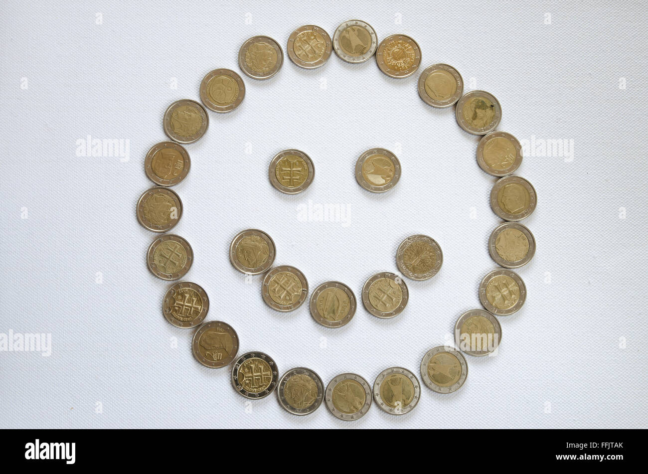 coin smile icon on white background Stock Photo - Alamy