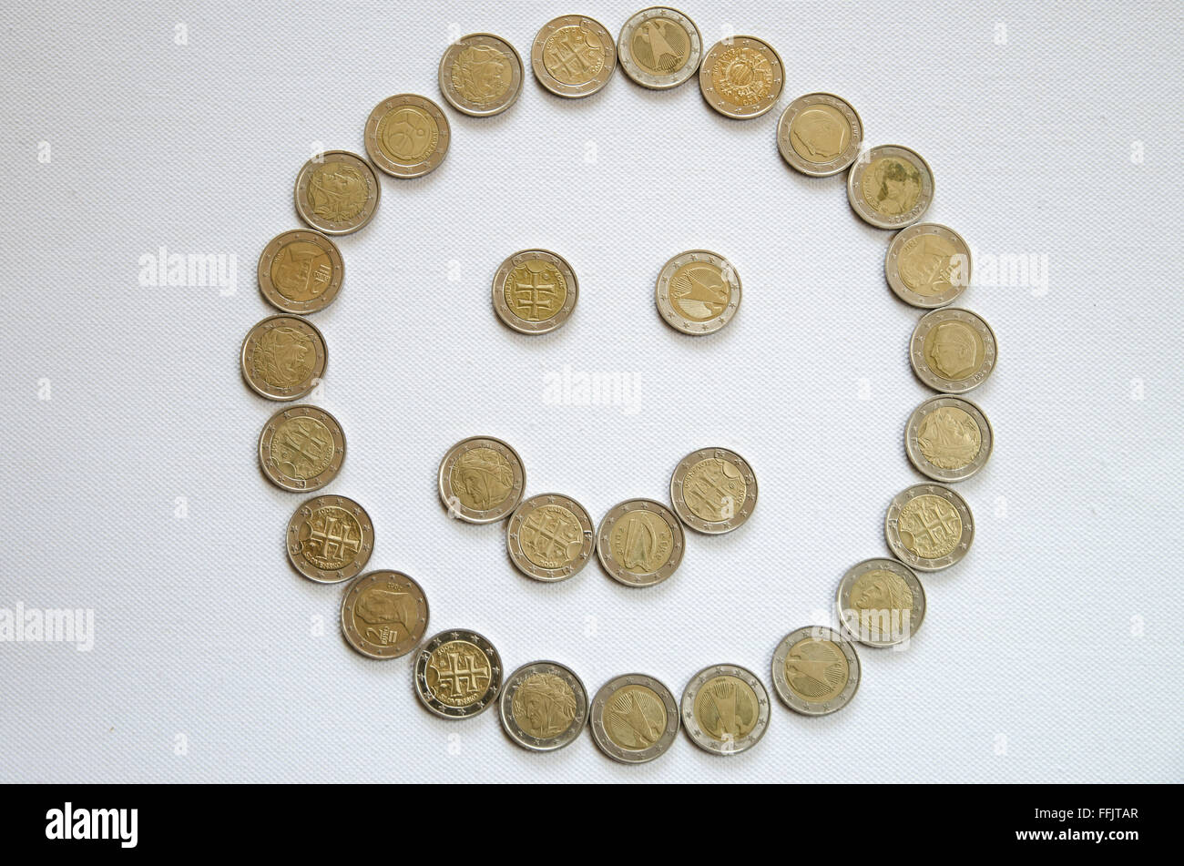 coin smile icon on white background Stock Photo - Alamy
