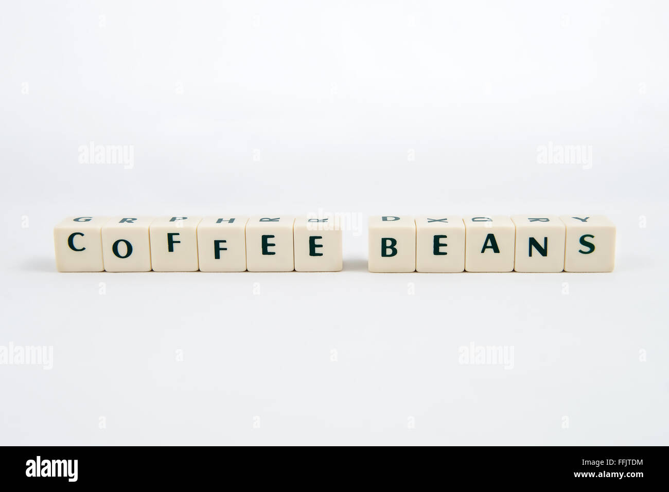 COFFEE BEANS white cube text on white background Stock Photo - Alamy