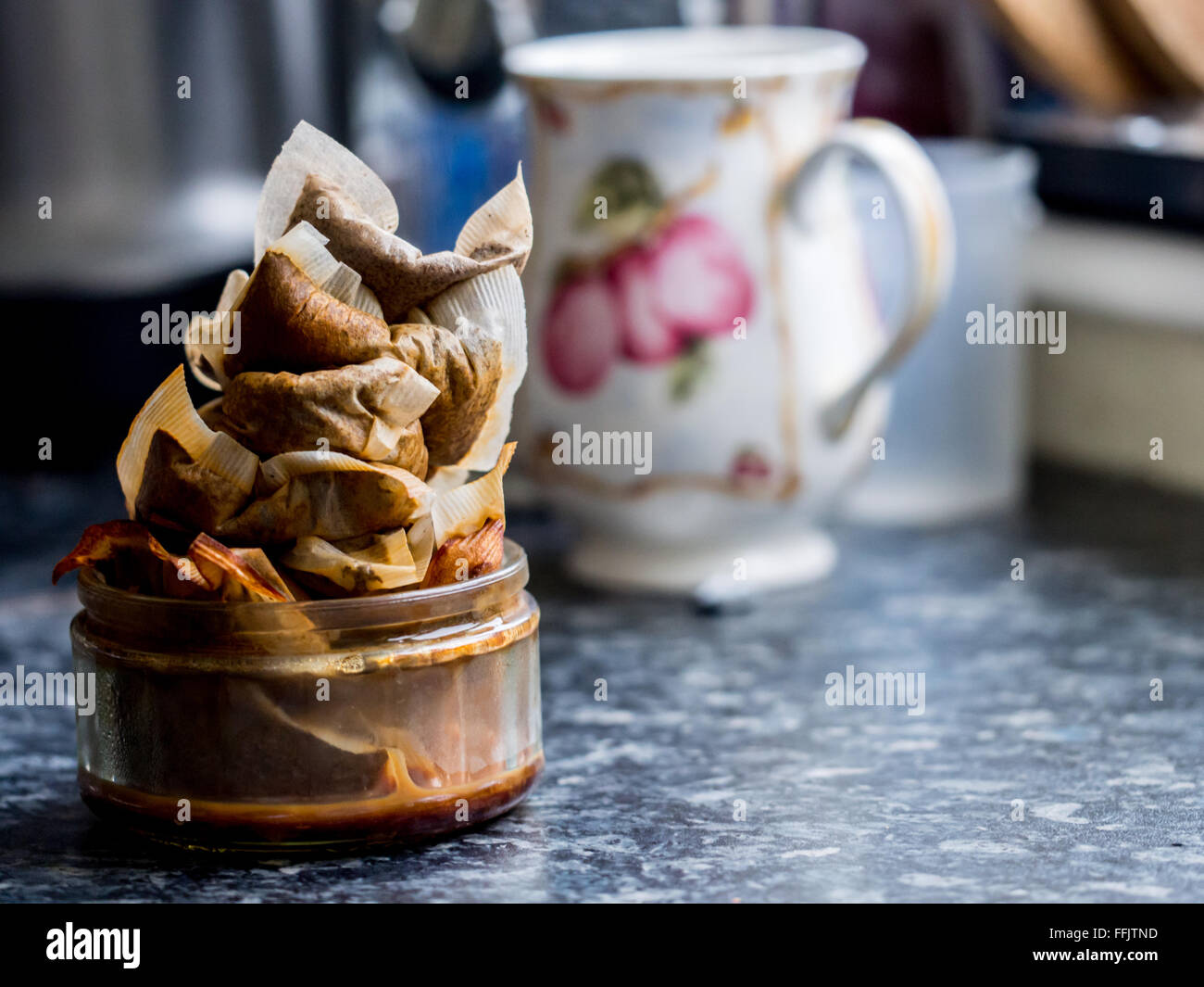 A heap of used tea bags, ready for home composting, in a real kitchen ...