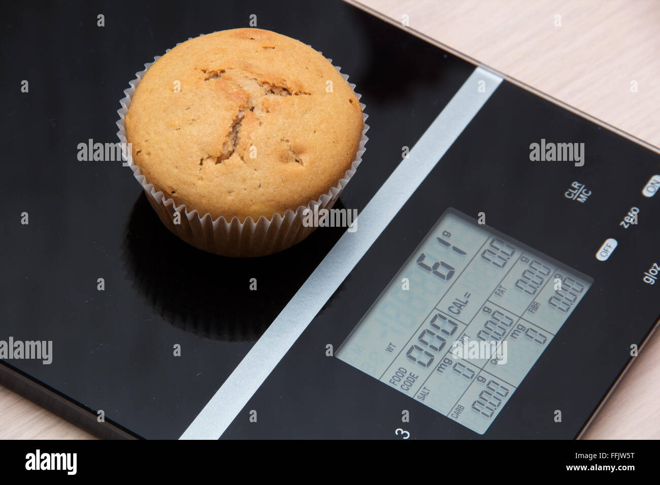 Cake on the scales Stock Photo - Alamy