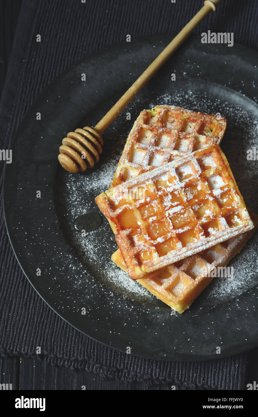 Traditional Belgian Waffles on a dark grey plate Stock Photo - Alamy