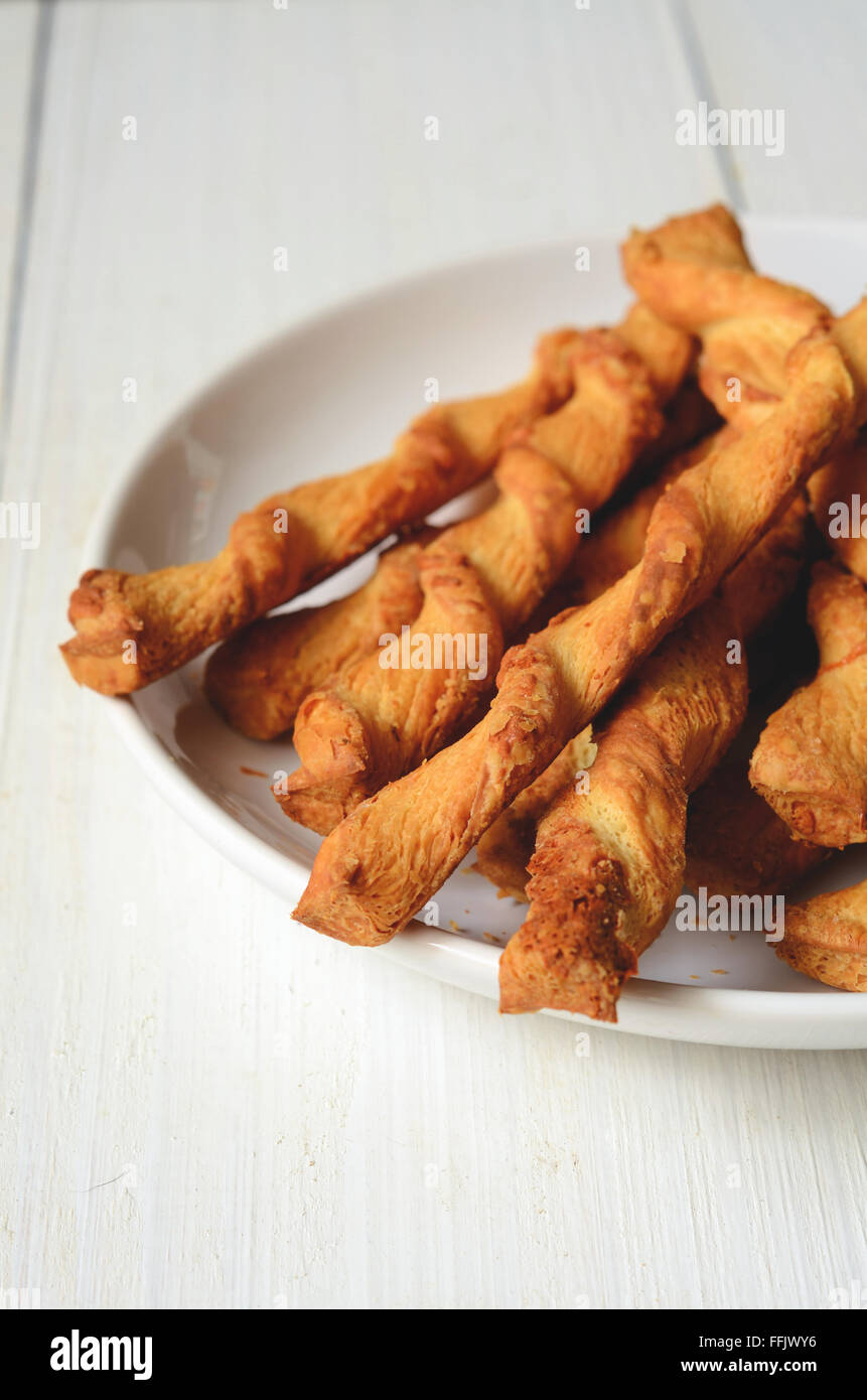 Cheese sticks with puff pastry and cheddar cheese Stock Photo - Alamy
