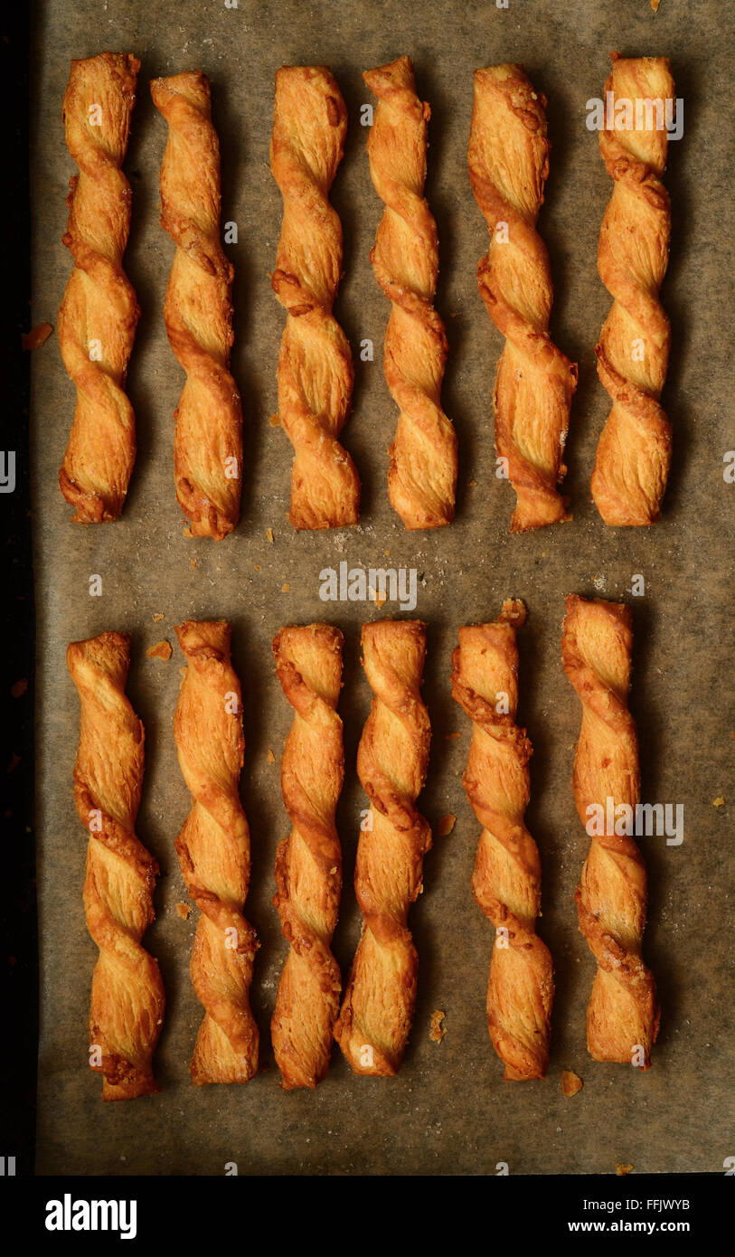 Cheese sticks with puff pastry and cheddar cheese Stock Photo - Alamy