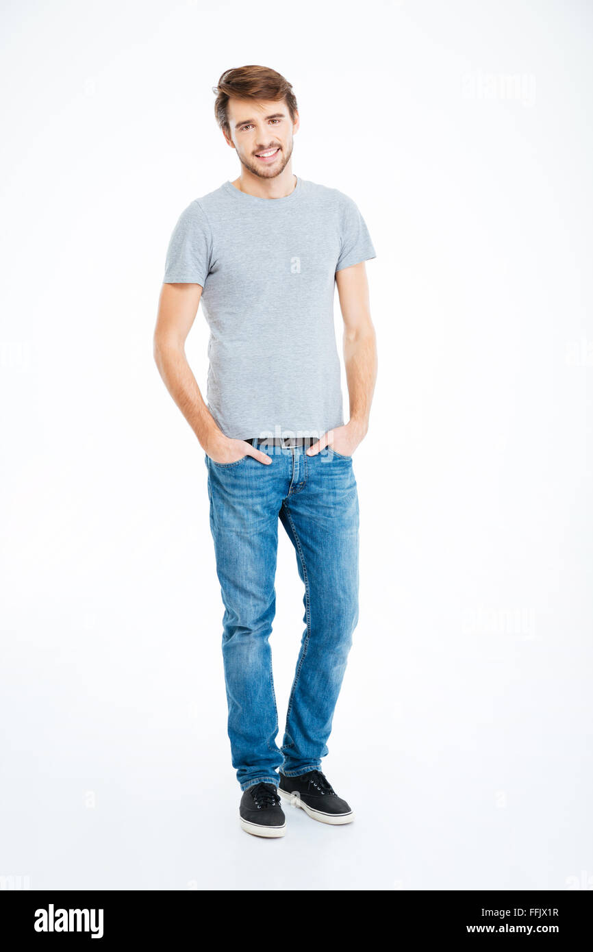 Full length portrait of a happy casual man standing isolated on a white ...