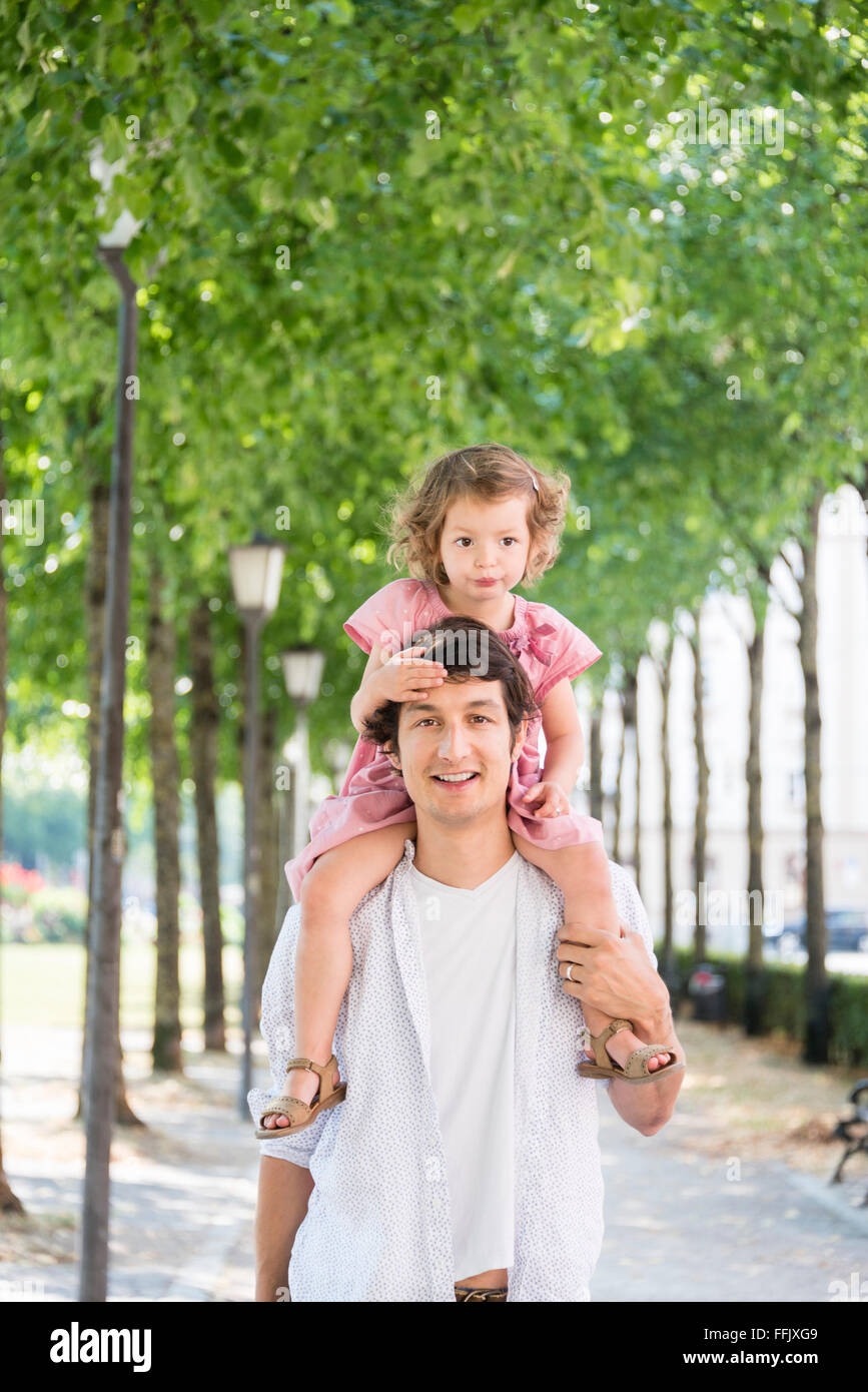Father carrying daughter shoulder hi-res stock photography and images - Alamy