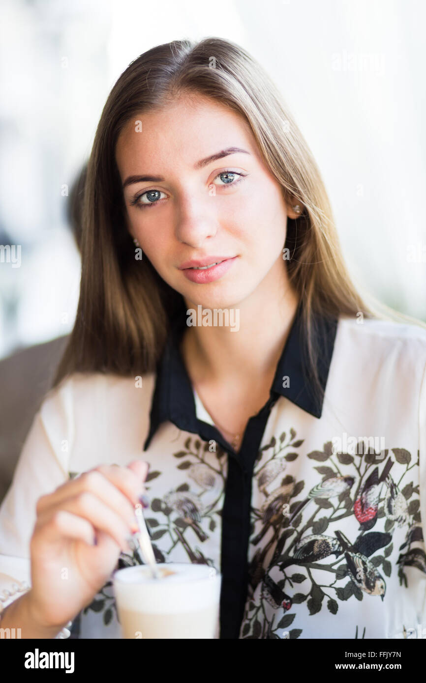 Young Beautiful Woman Having Her Morning Latte In Restaurant Gorgeous