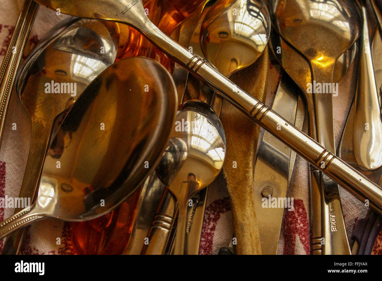 Cutlery golden spoon hi-res stock photography and images - Alamy