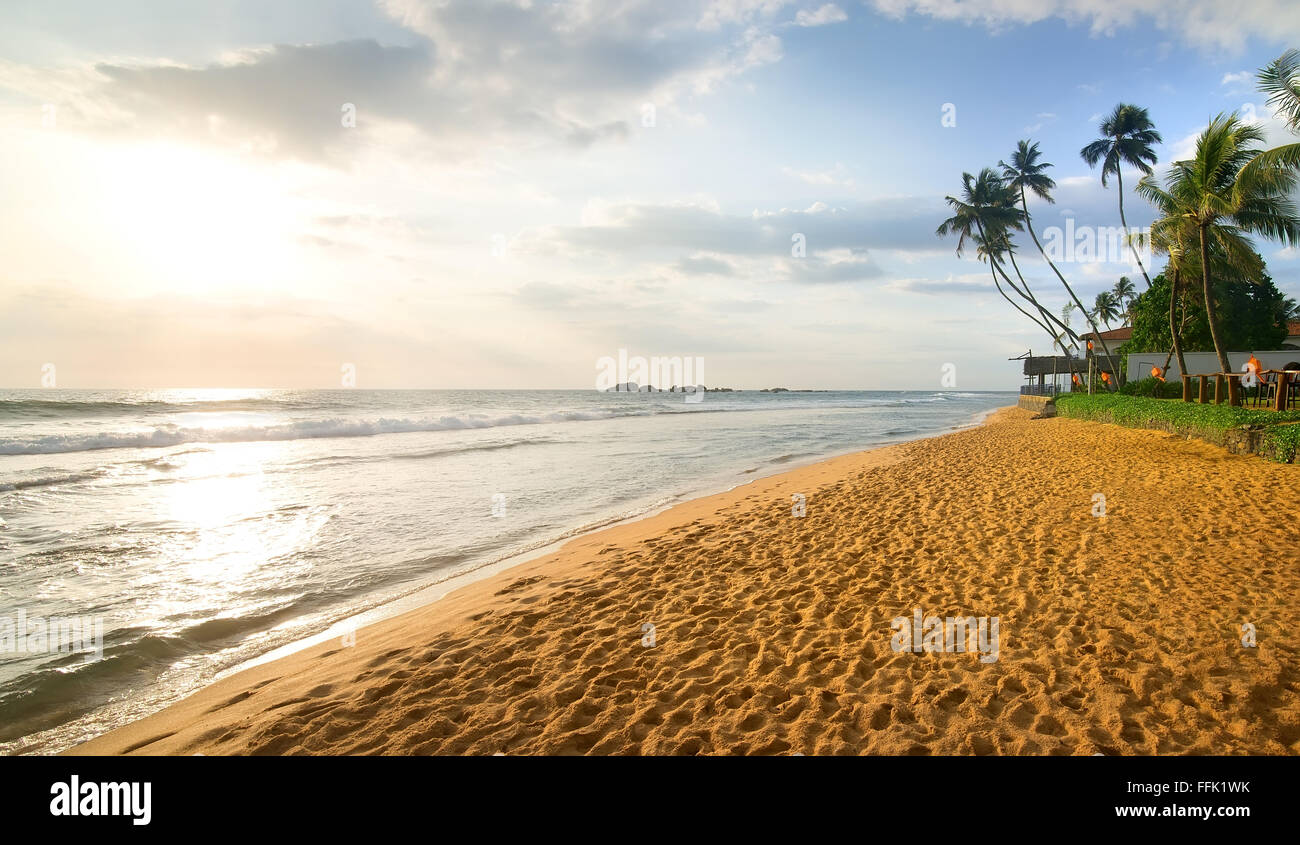Beautiful evening over the beach of Indian ocean Stock Photo - Alamy