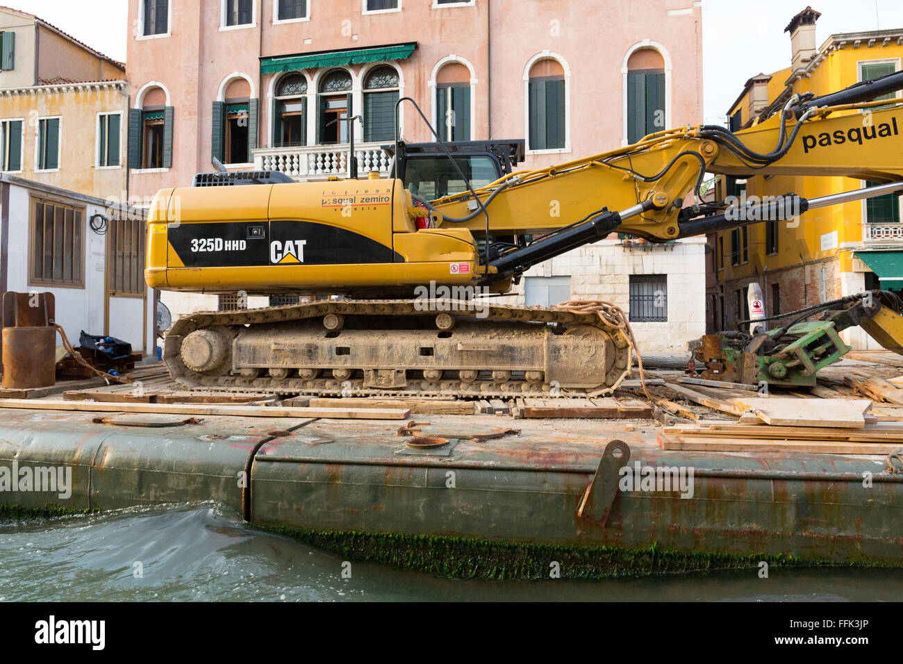 CAT construction vehicle, Venice Stock Photo - Alamy