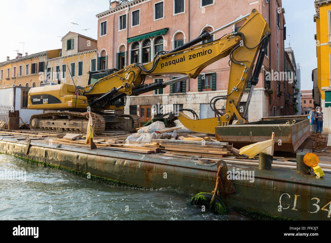 CAT construction vehicle, Venice Stock Photo - Alamy