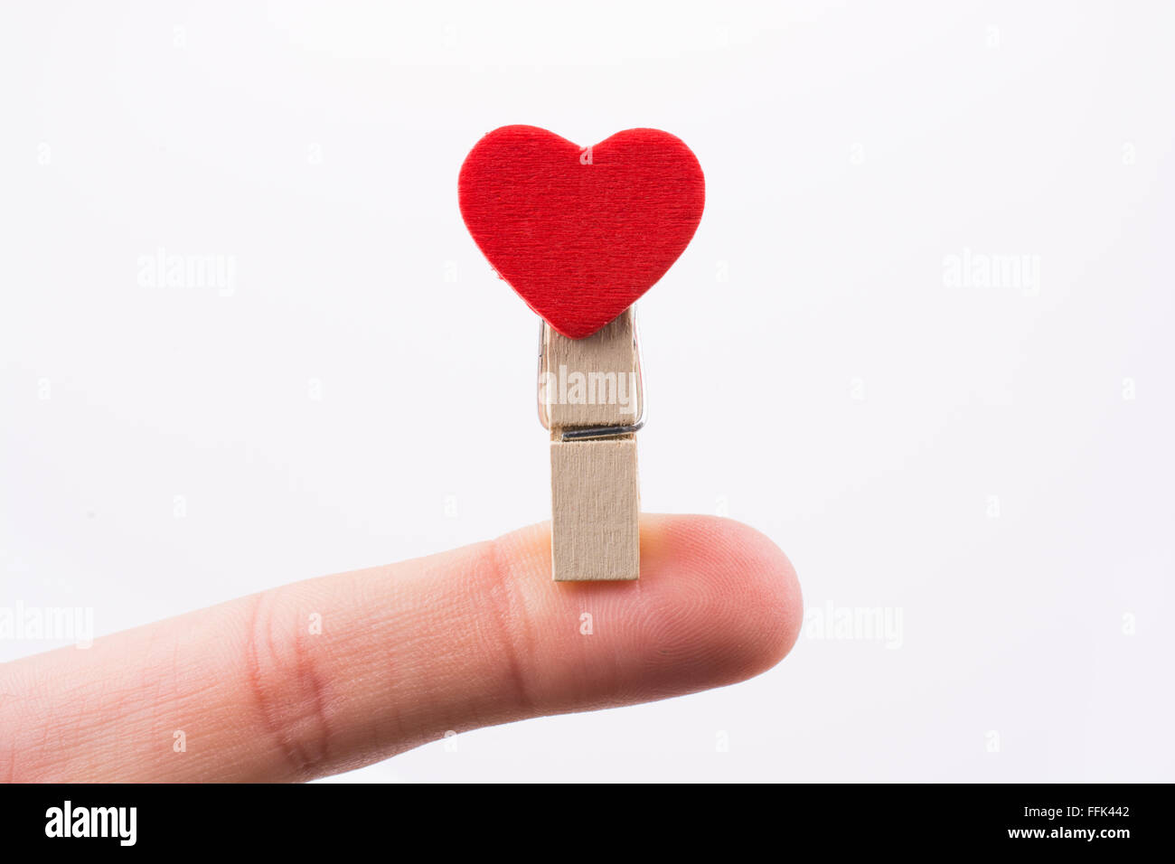 Hearted clip on a hand Stock Photo - Alamy