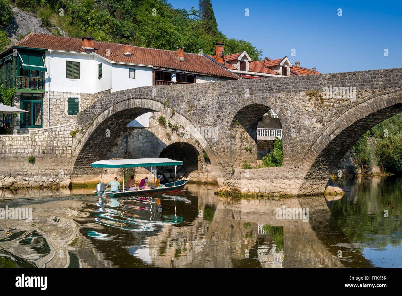 Boat trips of Rijeka Crnojevica town Stock Photo - Alamy