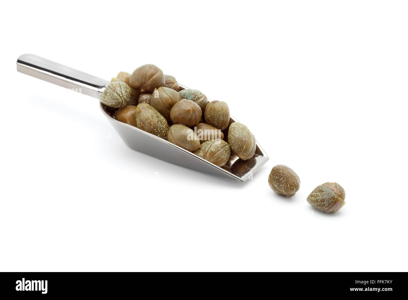 Spoon with capers on white background Stock Photo - Alamy