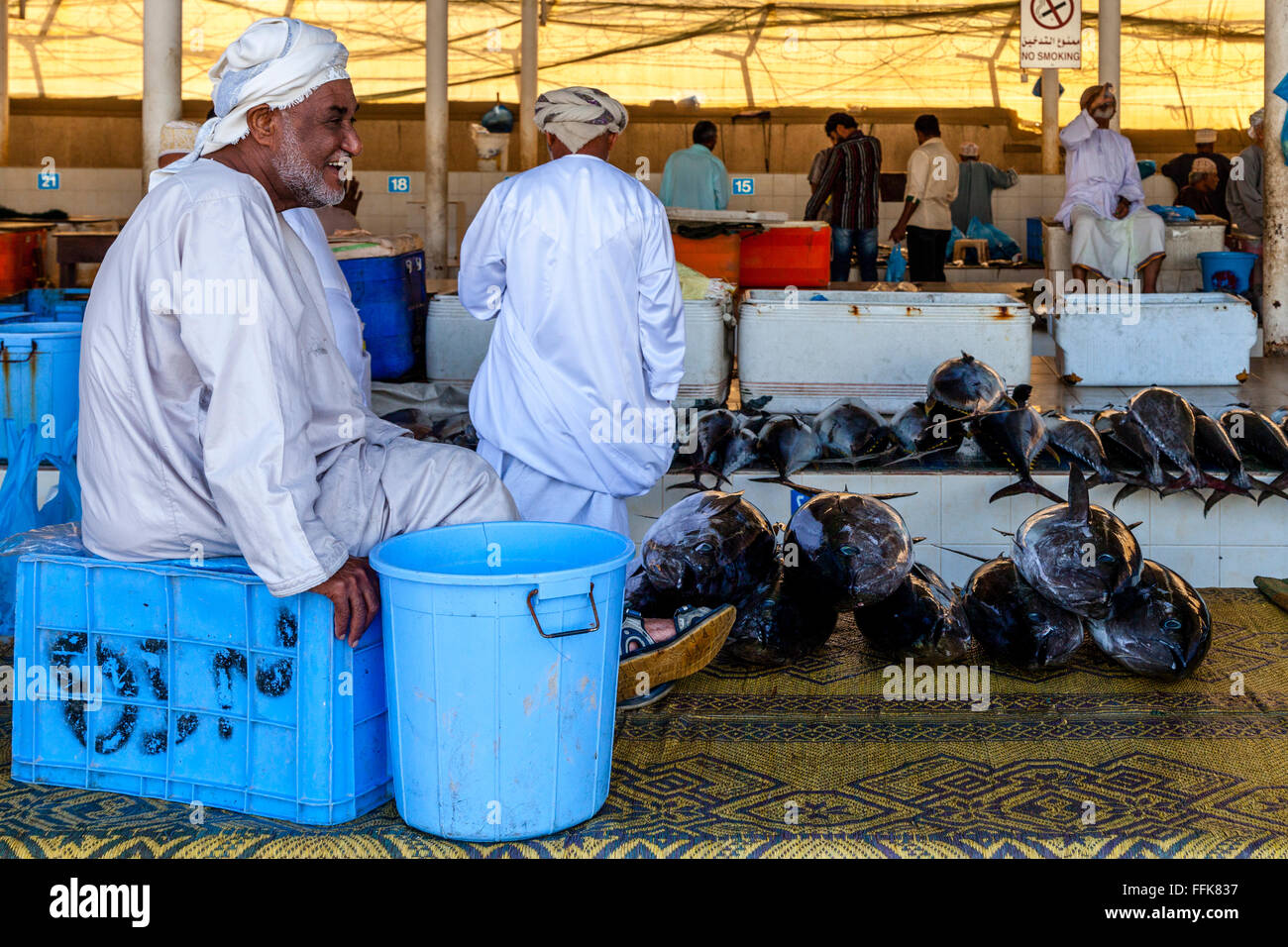 An Omani Man Sells Fish At The Fish Market, Muttrah, Muscat, Sultanate ...