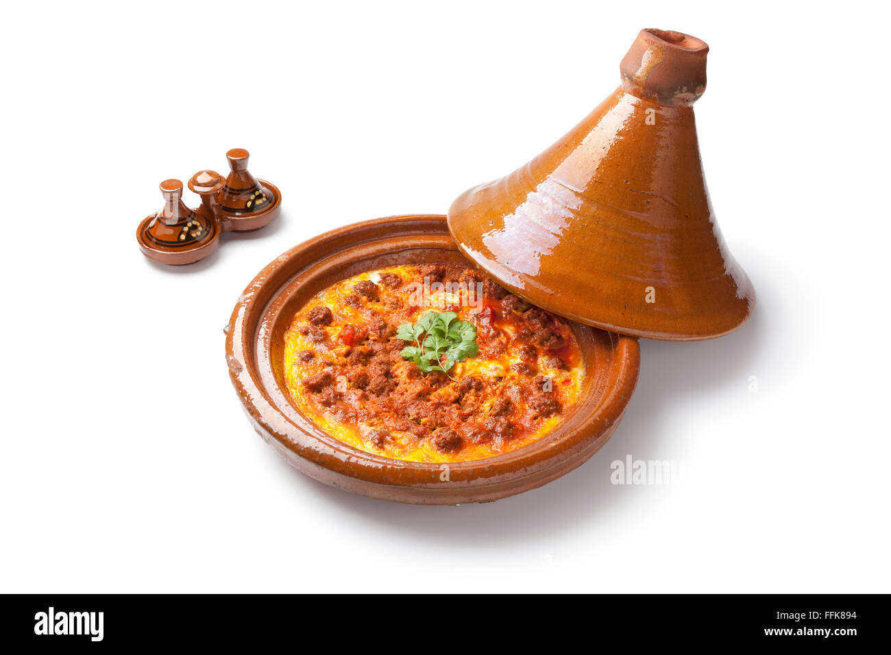 Traditional Moroccan tajine with egg and minced meat on white ...