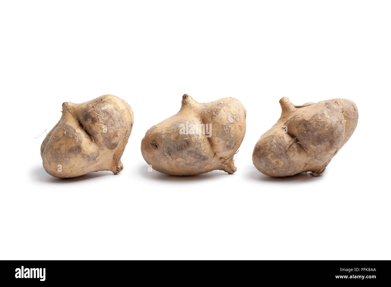 Fresh Jicamas isolated on white background Stock Photo - Alamy