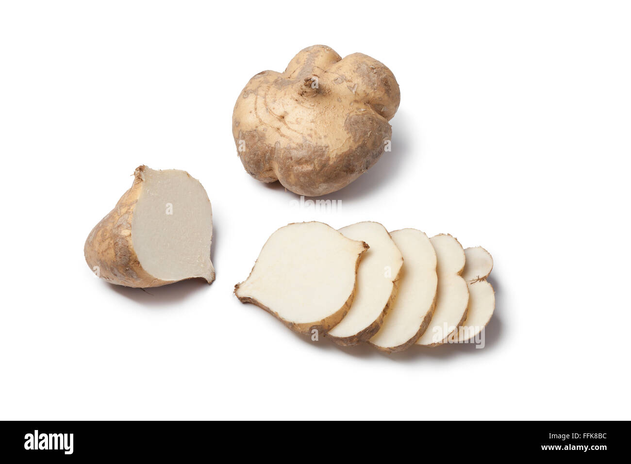 Whole and sliced fresh Jicama isolated on white background Stock Photo ...