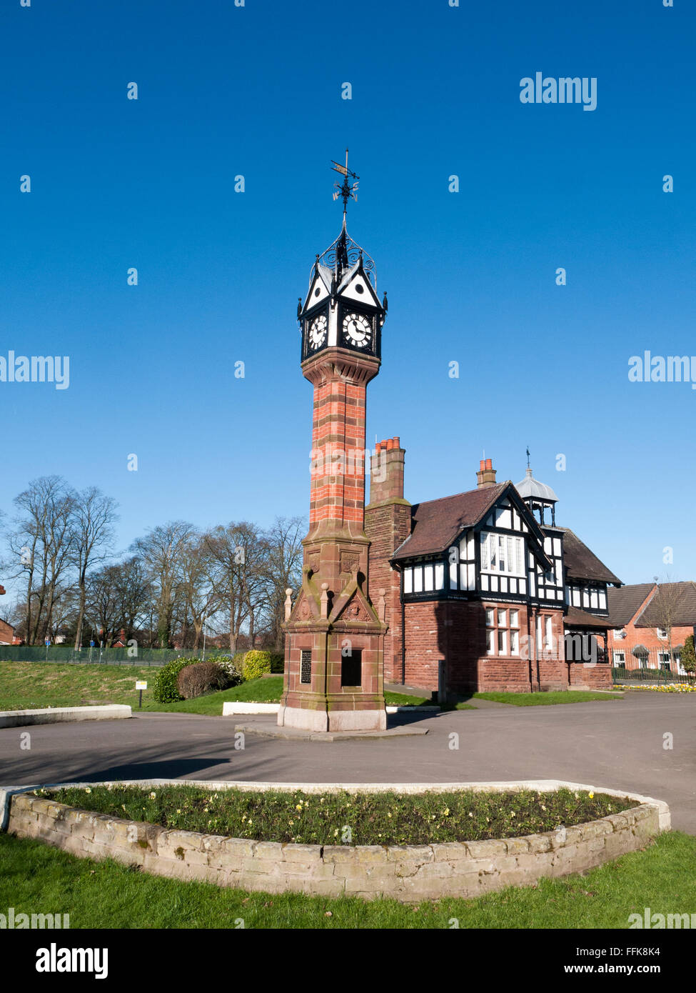 Clock tower with lodge in Queens Park, Crewe Cheshire UK Stock Photo ...